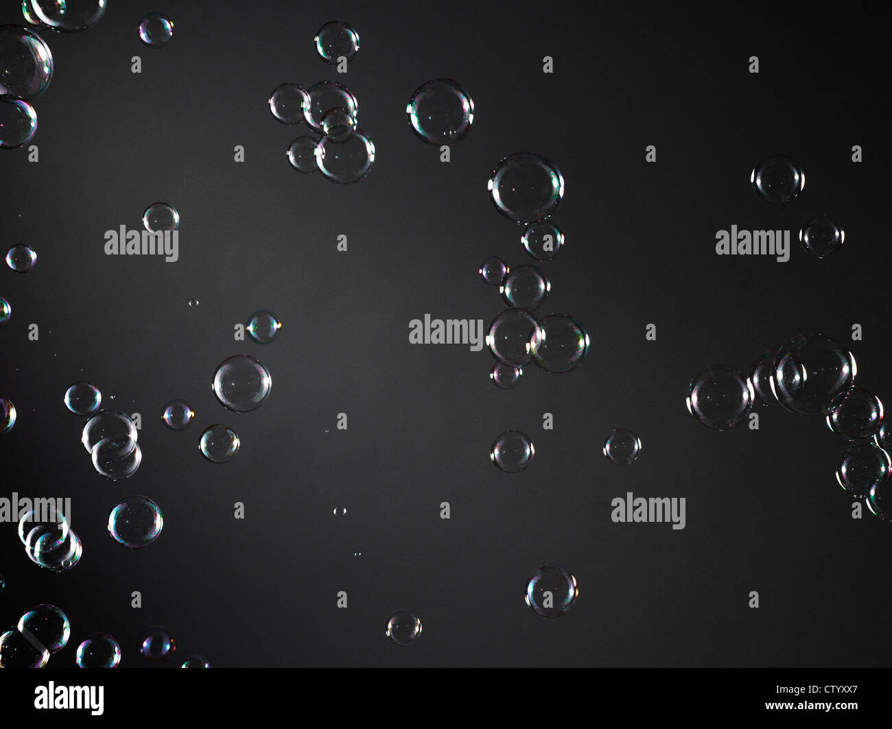 Bubbles floating in air Stock Photo - Alamy