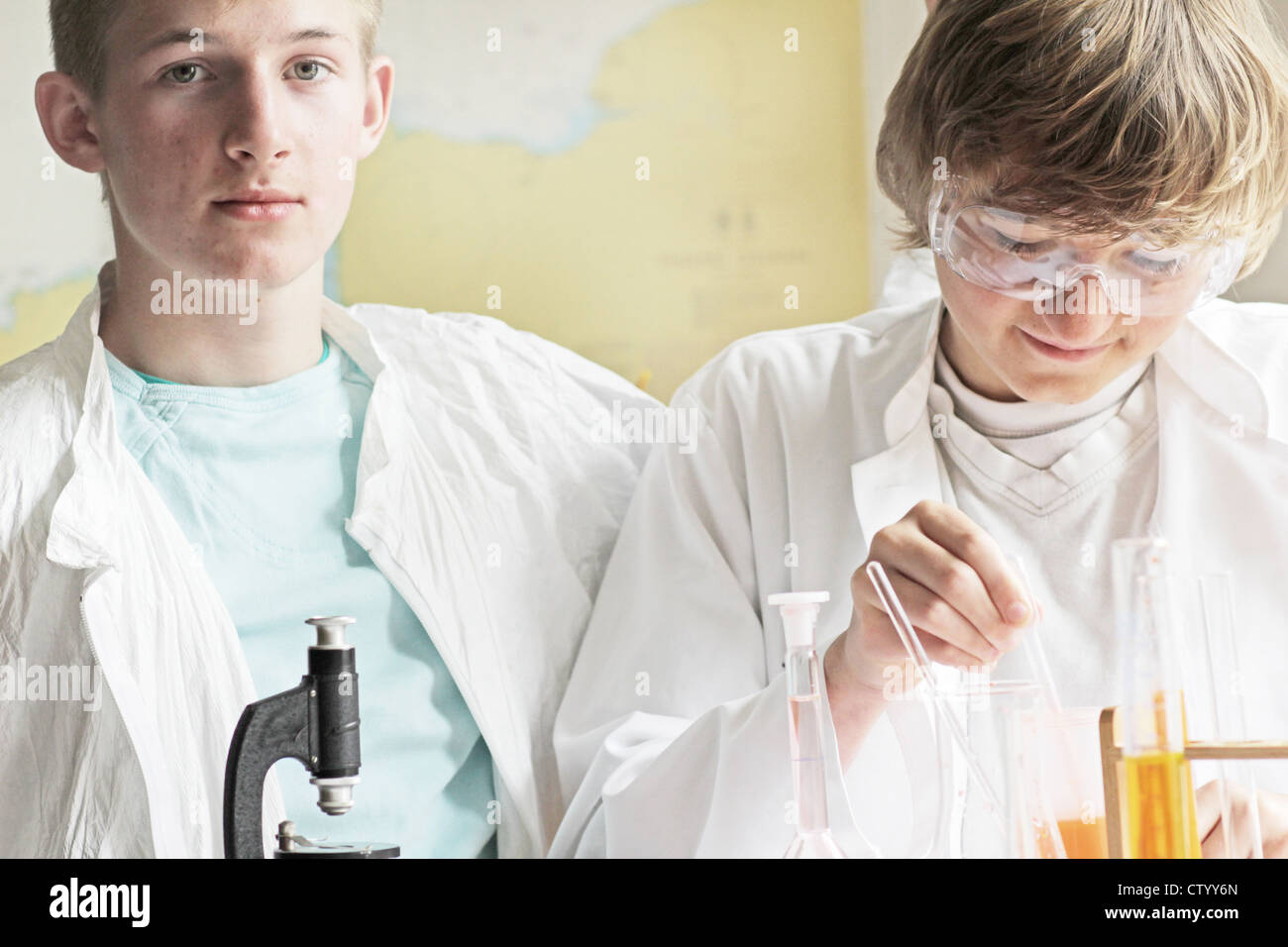 Students working in science lab Stock Photo - Alamy