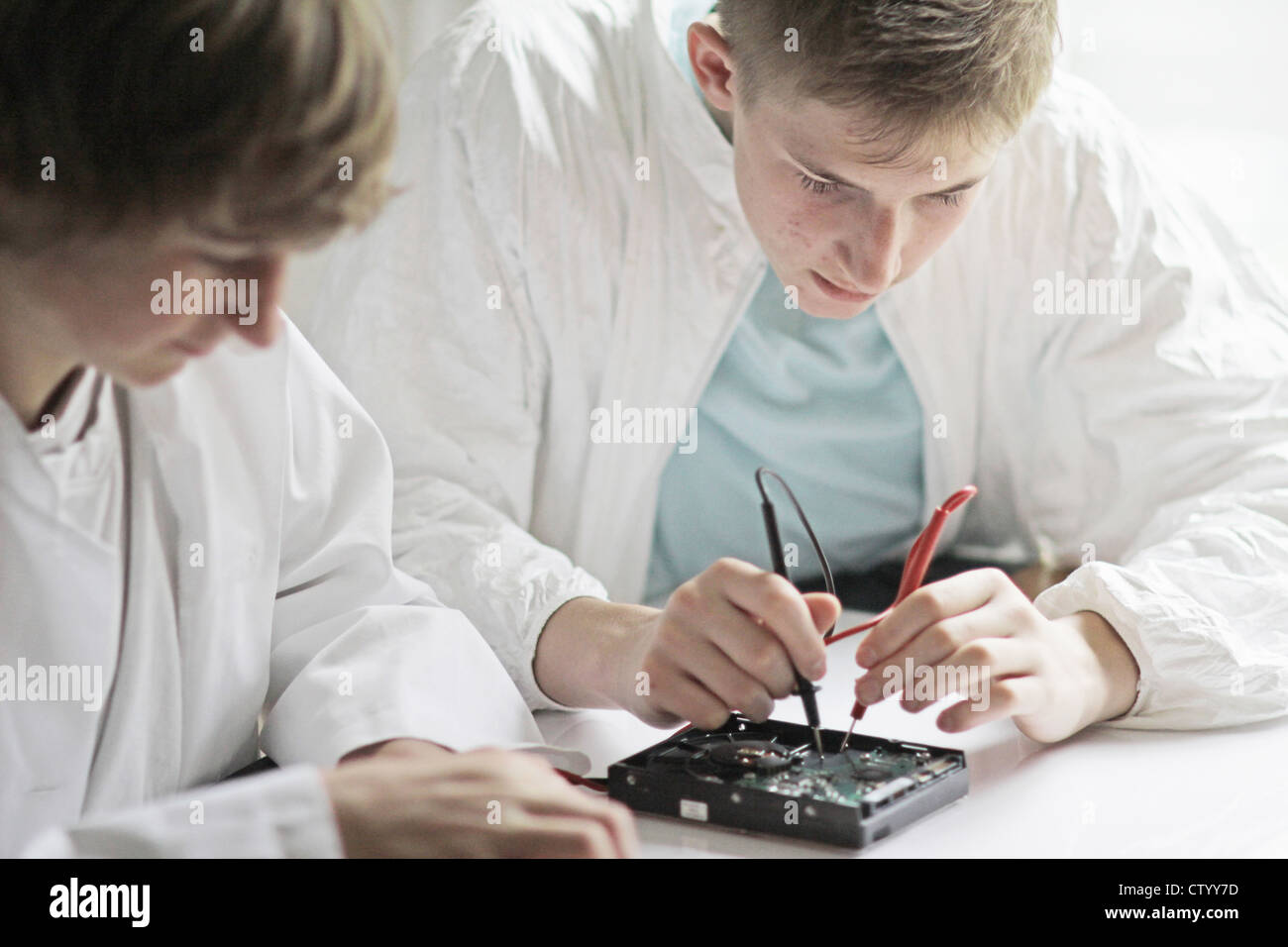 Students working in science lab Stock Photo - Alamy