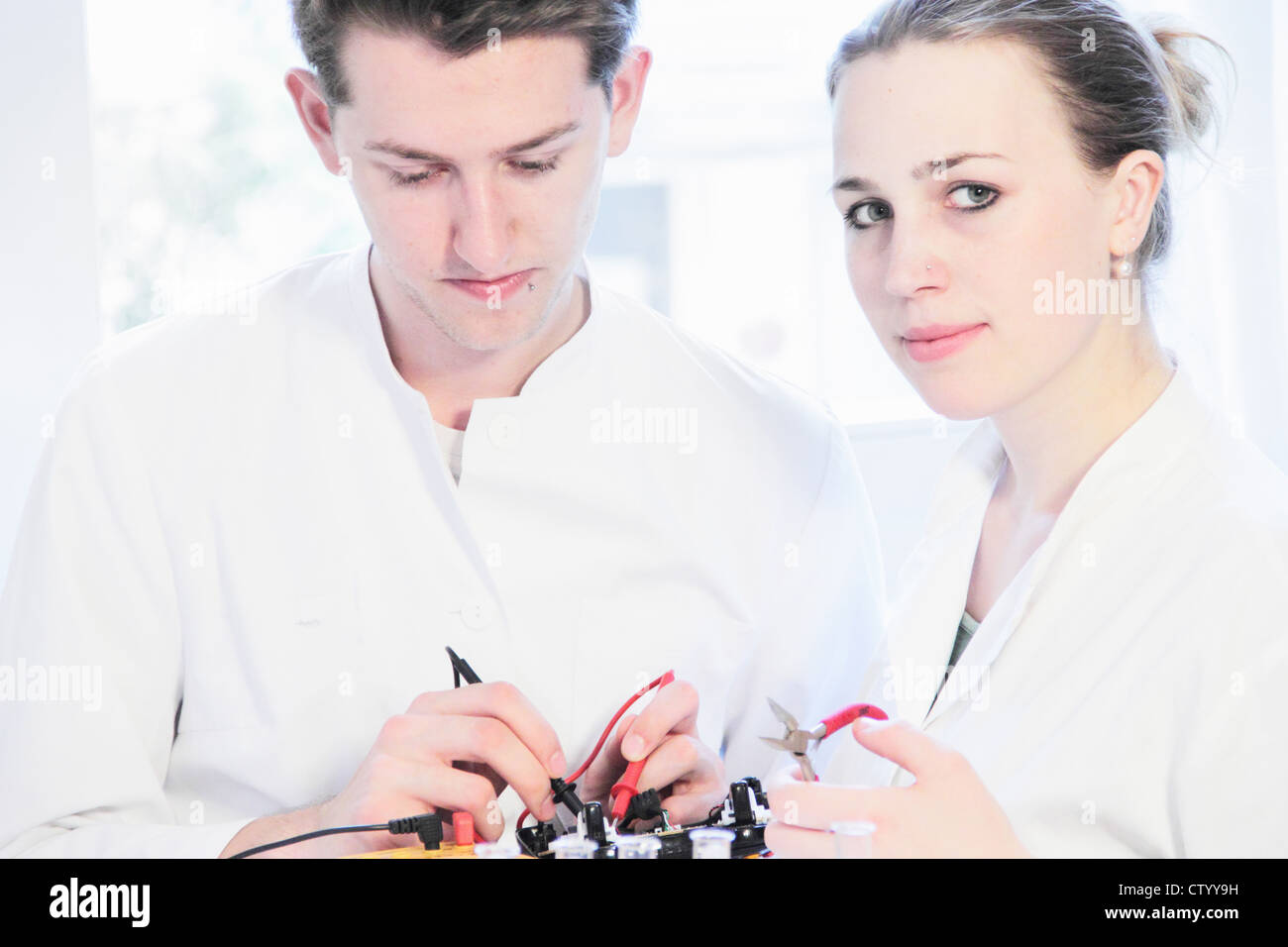 Students working in science lab Stock Photo - Alamy