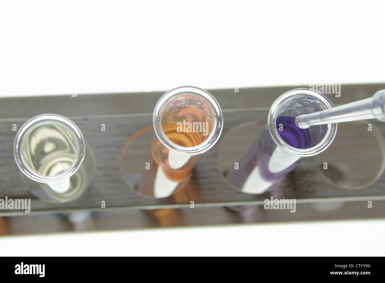 Orange and white test tube liquid hi-res stock photography and images ...