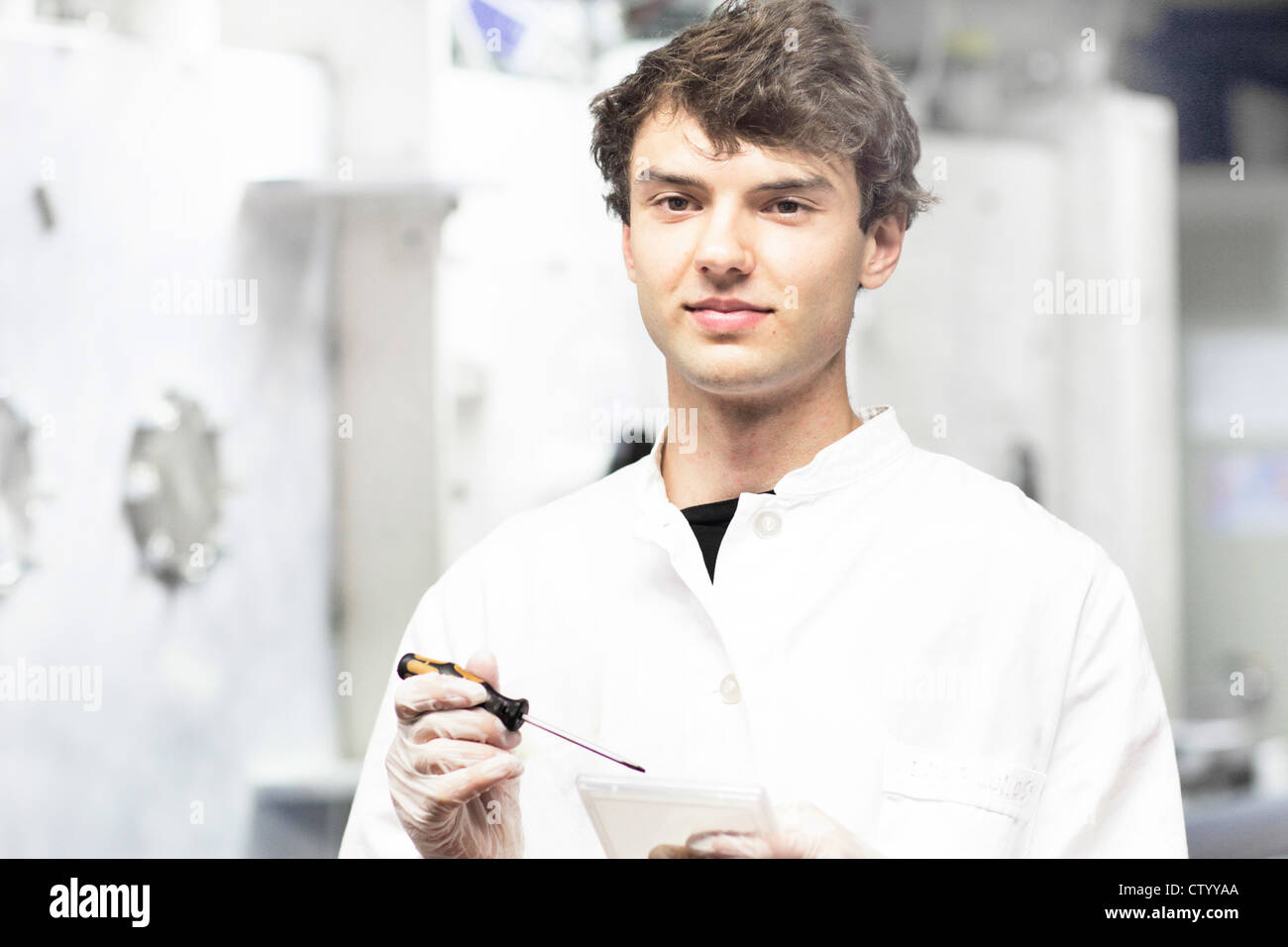 Scientist standing in lab Stock Photo - Alamy