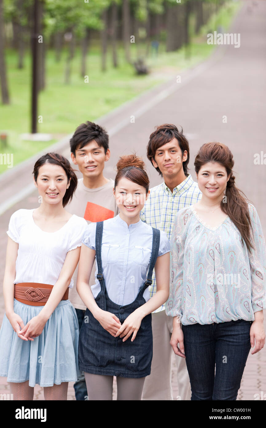 Five university students smiling Stock Photo - Alamy
