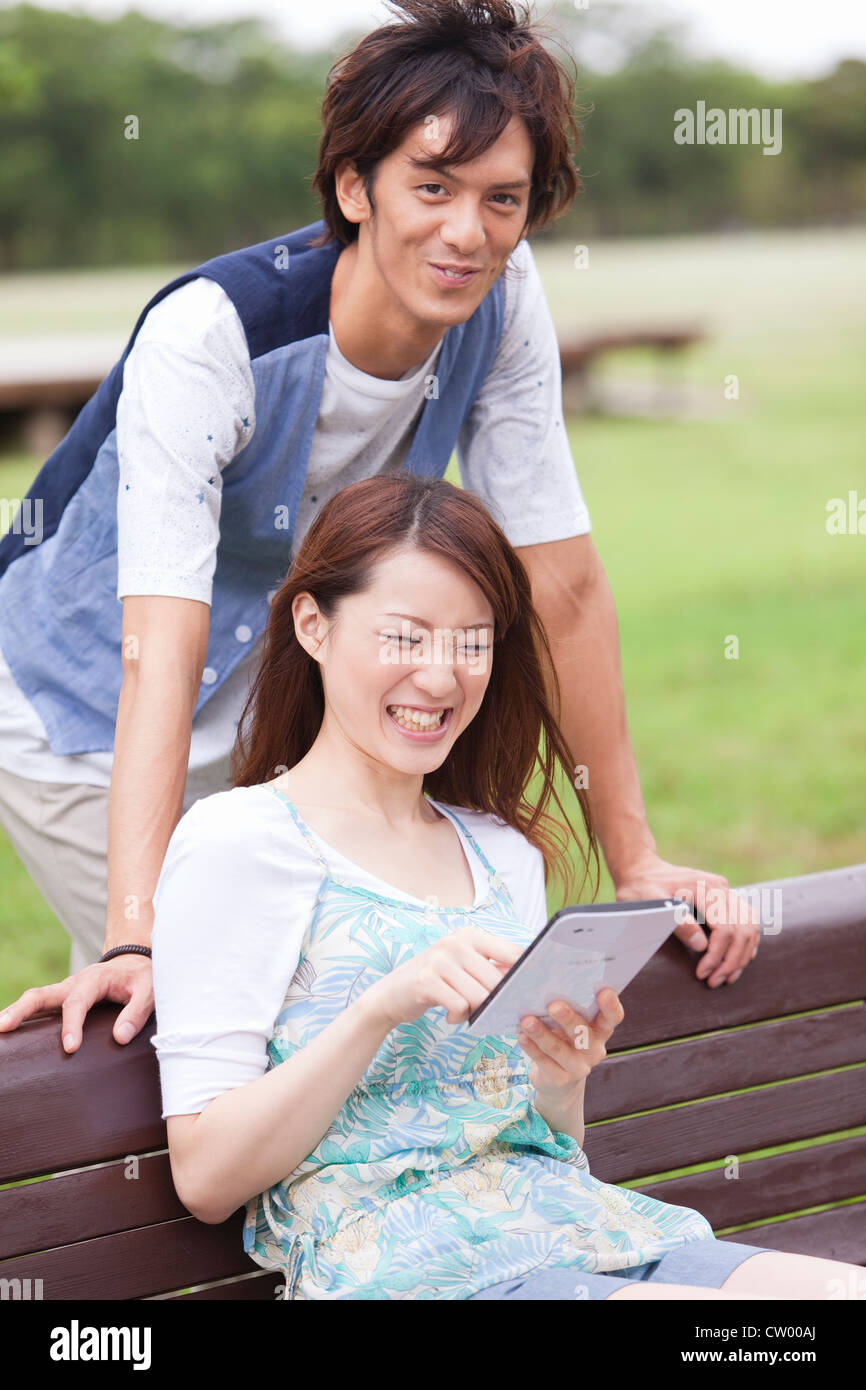 Two university students using tablet PC Stock Photo - Alamy