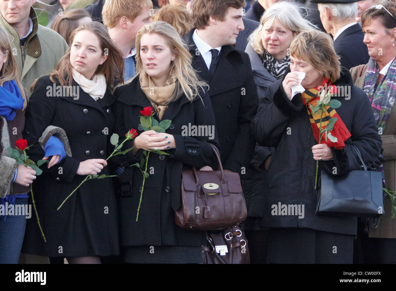 Friends, family & colleagues of Lt. David Boyce react during a ...