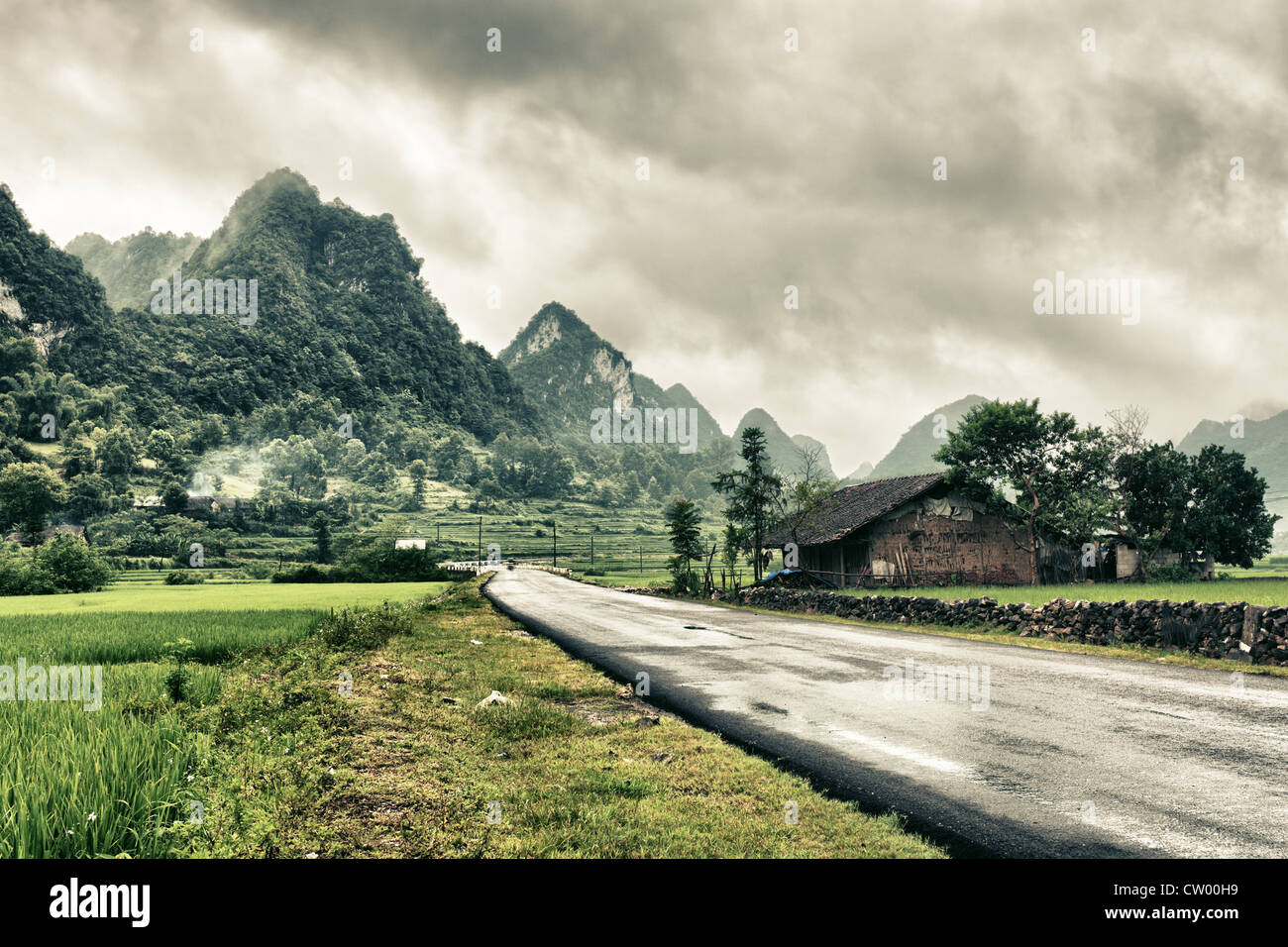 Rural landscape with road; house and mountains Stock Photo - Alamy