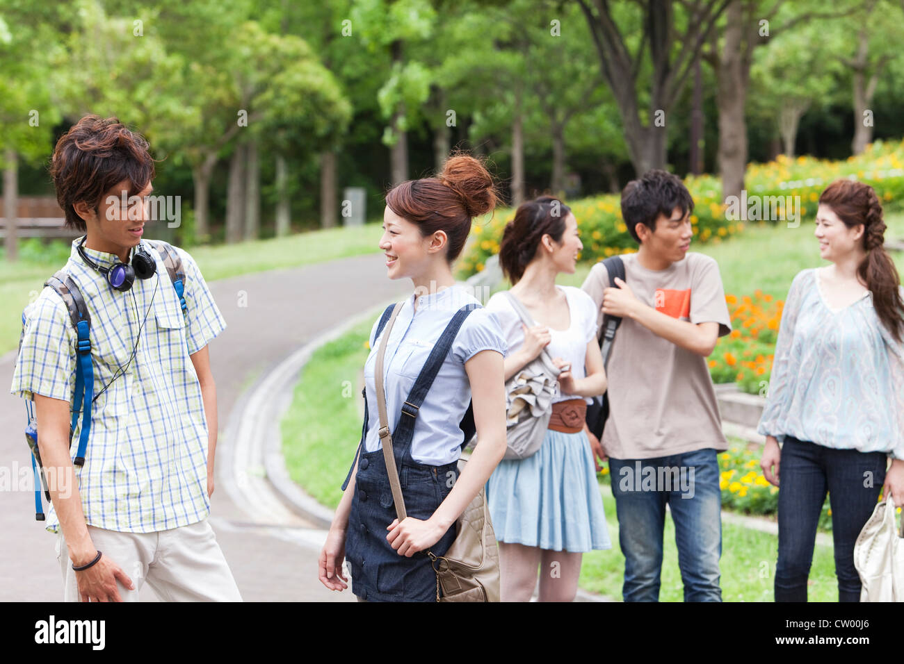 Five university students smiling Stock Photo - Alamy