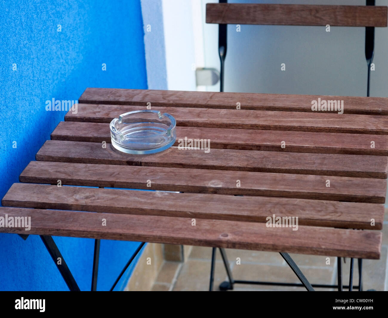 Ashtray on a table Stock Photo - Alamy