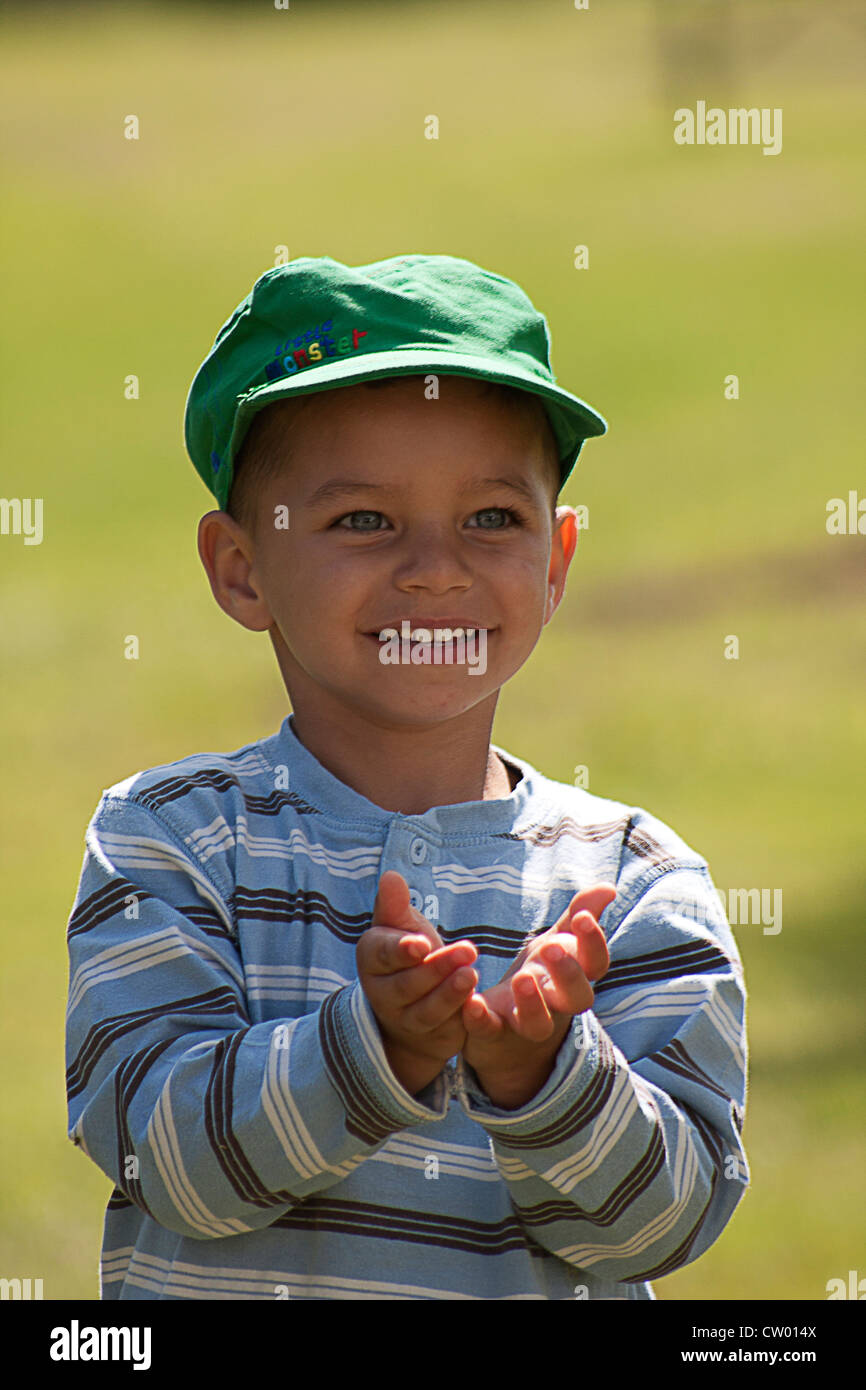 little boy holding out his hands Stock Photo - Alamy