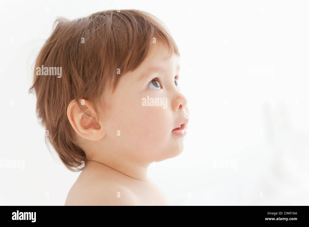 Baby boy Looking Up Stock Photo - Alamy