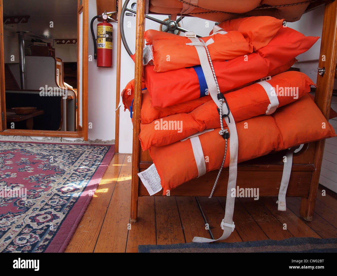 A stack of life jackets in the cabine of a private boat in Casco Bay ...