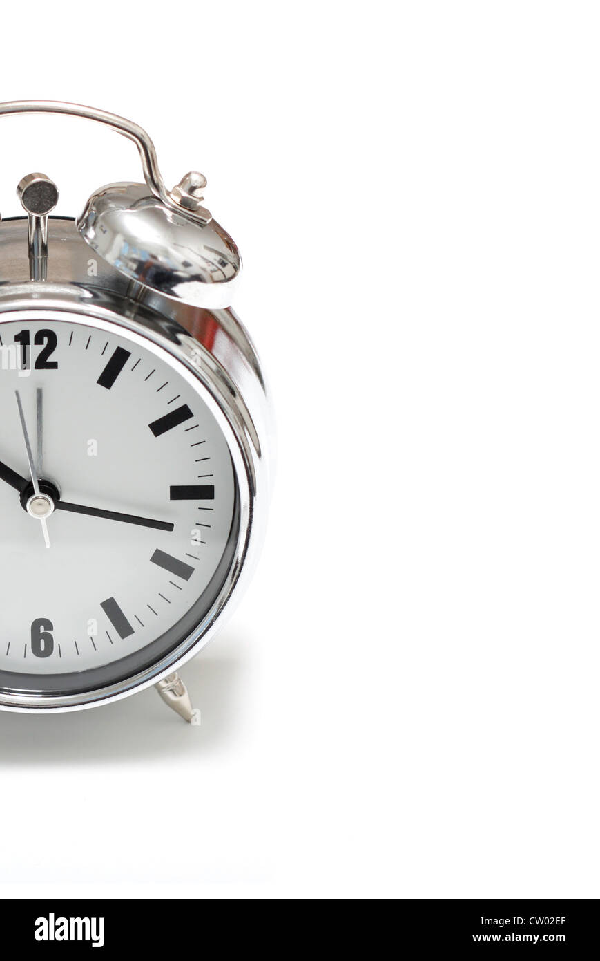 A half alarm clock in chrome Stock Photo - Alamy