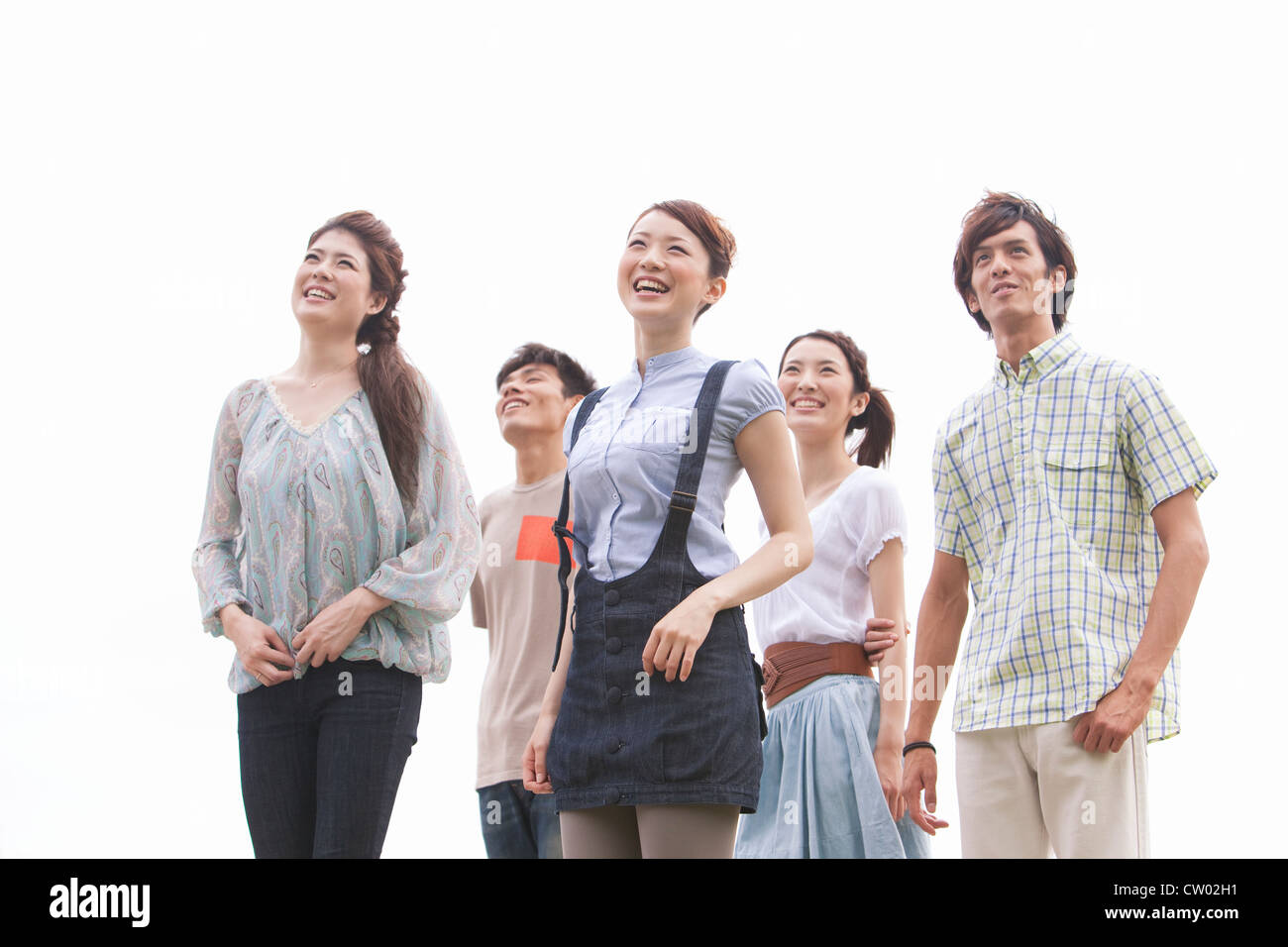 Young people smiling Stock Photo - Alamy