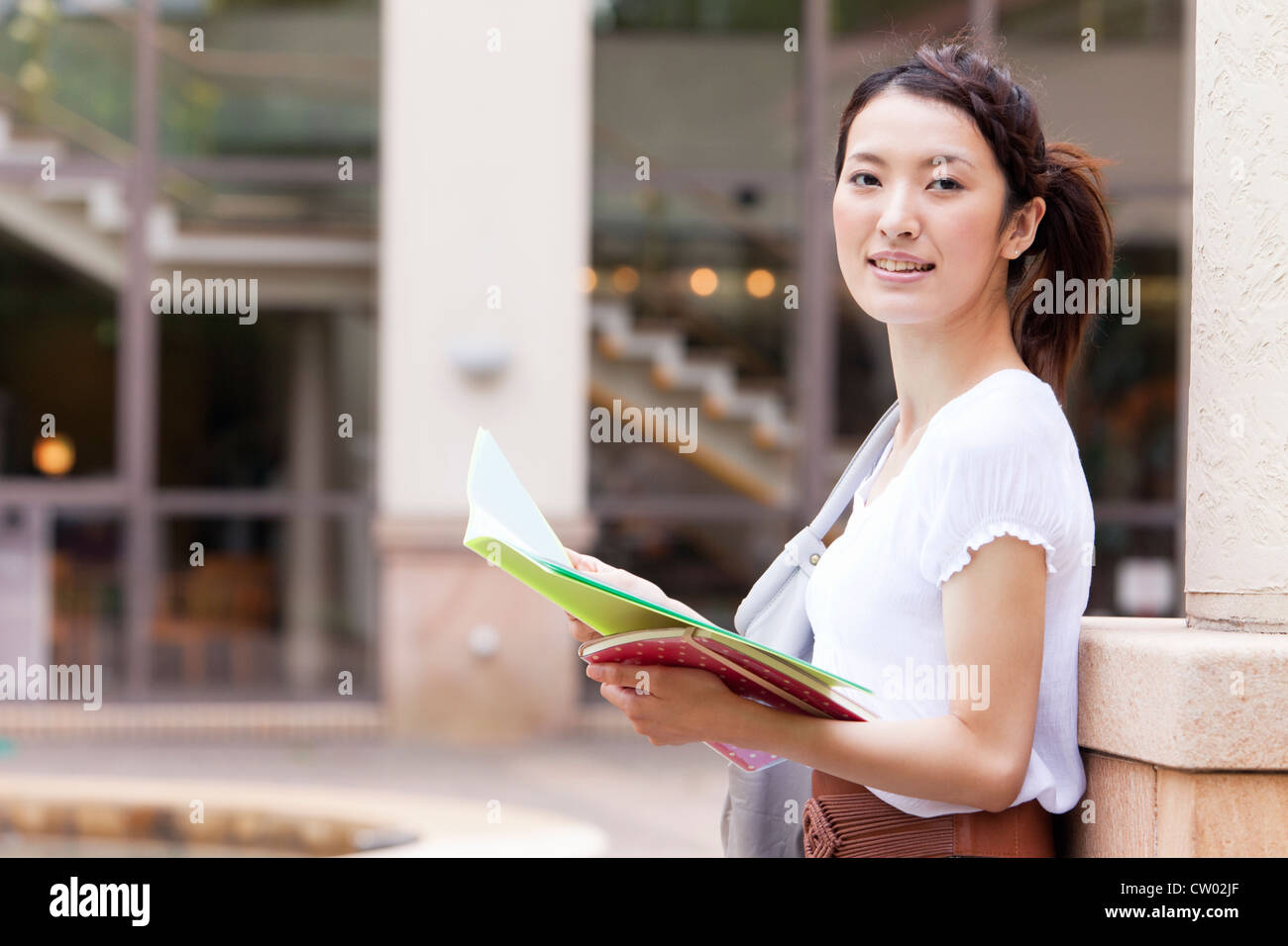 Female university student looking away Stock Photo - Alamy