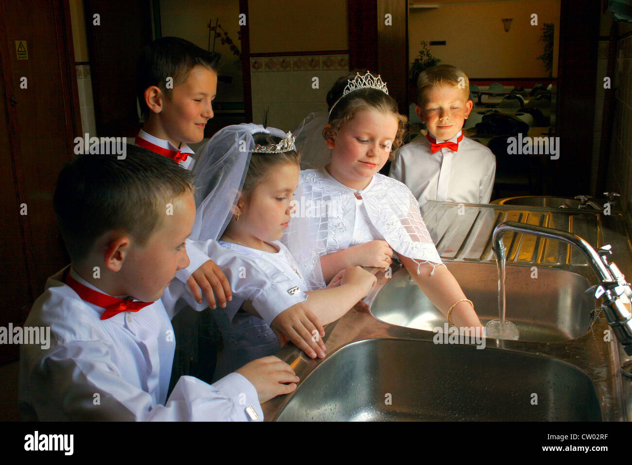 Children making their first communion Stock Photo - Alamy