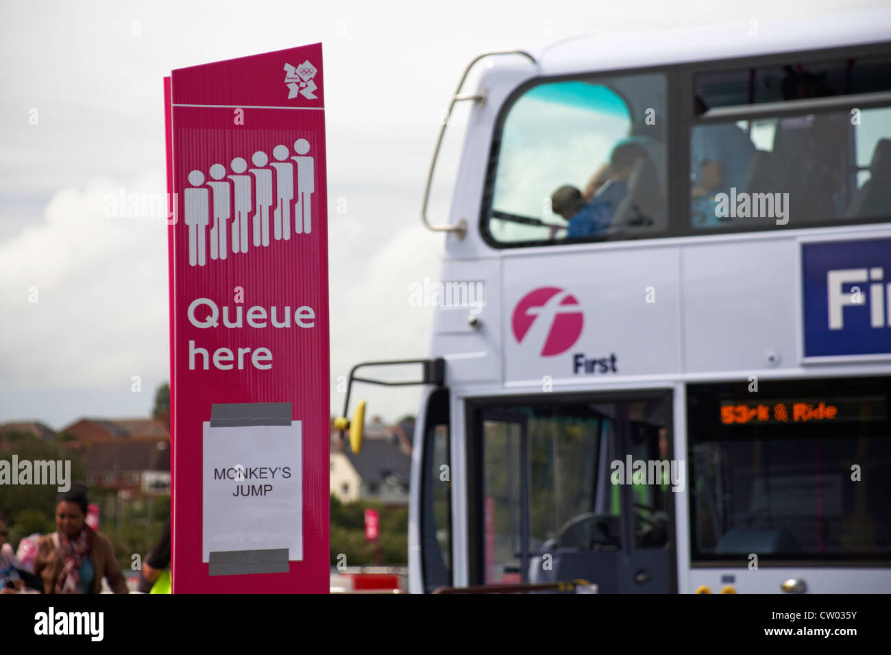 Queue here sign for shuttle buses from Weymouth to Monkey's Jump park ...