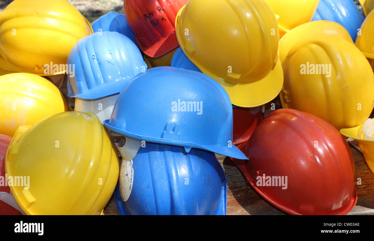 Yellow hard hats isolated hi-res stock photography and images - Alamy