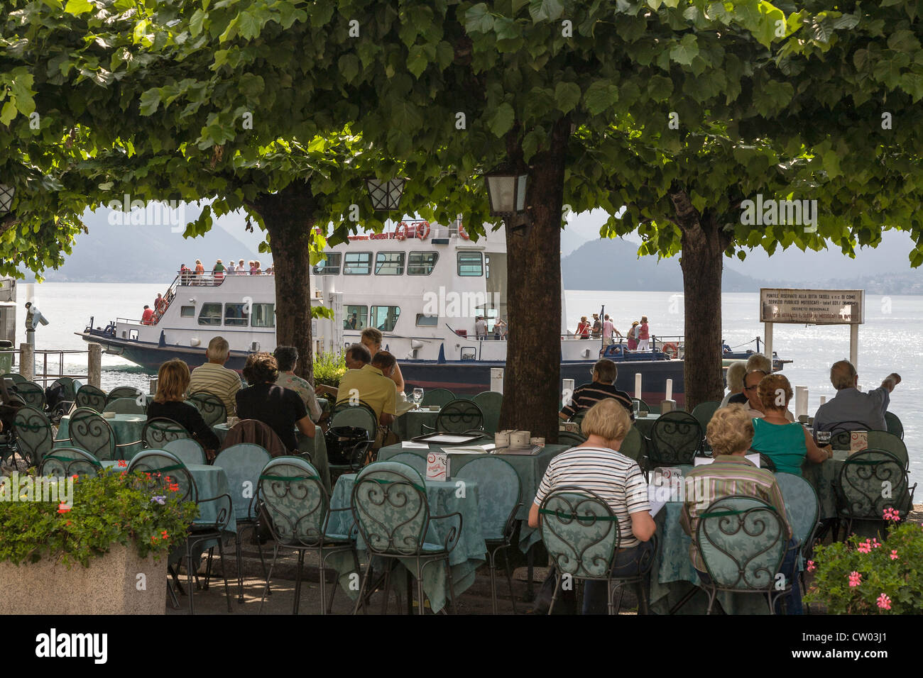 Restaurant tables under trees hi-res stock photography and images - Alamy