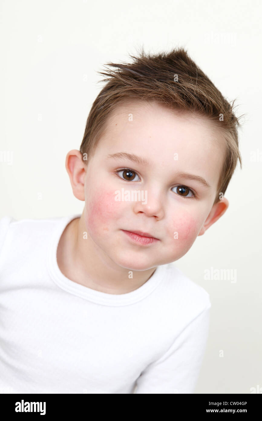 Close up of boys smiling face Stock Photo - Alamy