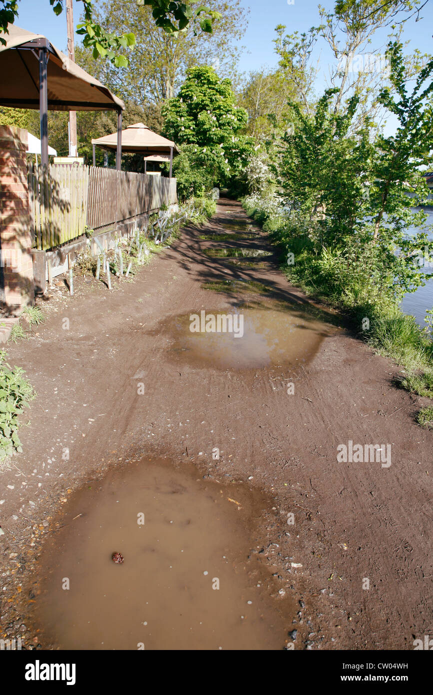 Muddy Puddle Road After Rain High Resolution Stock Photography and ...