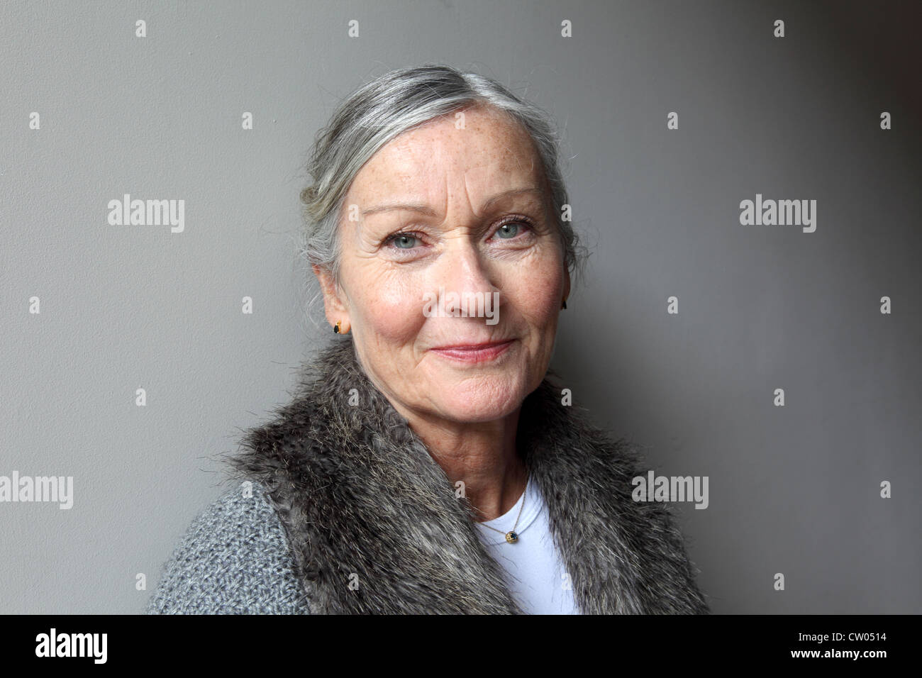 Close up of older womans smiling face Stock Photo - Alamy