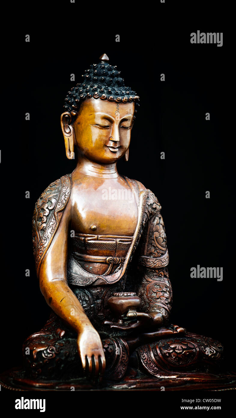 Buddhist devotional statues hi-res stock photography and images - Alamy