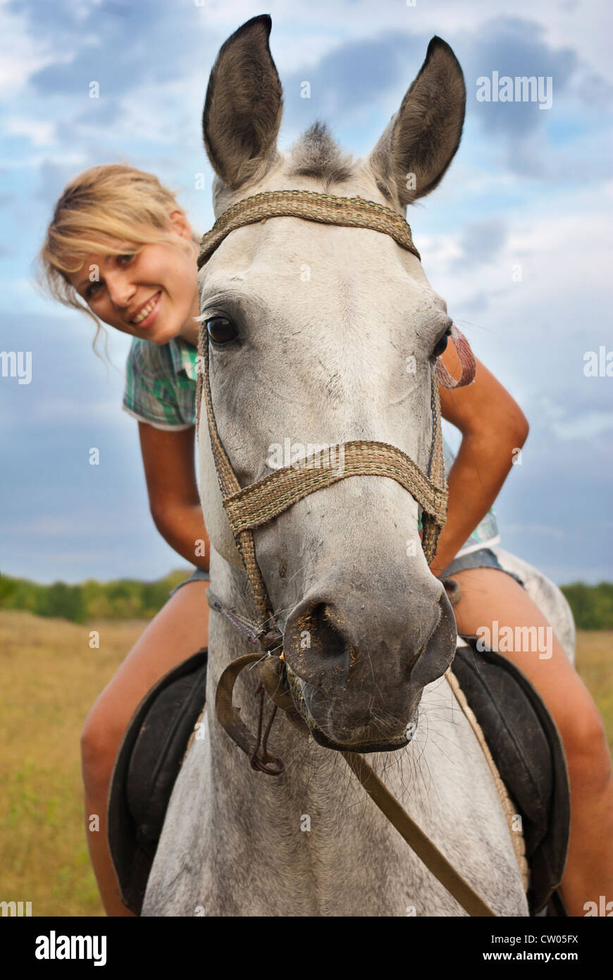 Women riding horse hi-res stock photography and images - Alamy