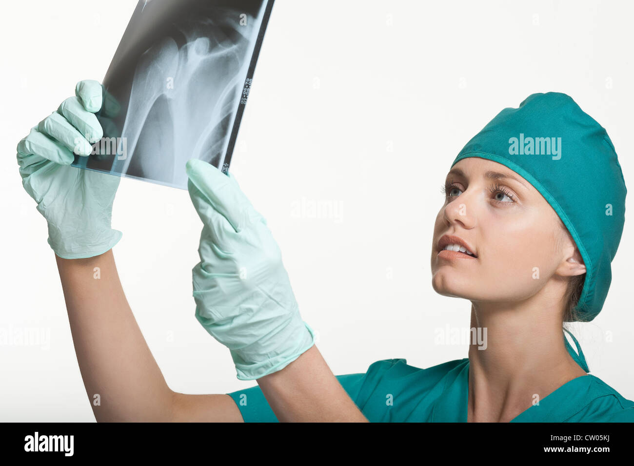 Surgeon examining x-rays Stock Photo - Alamy