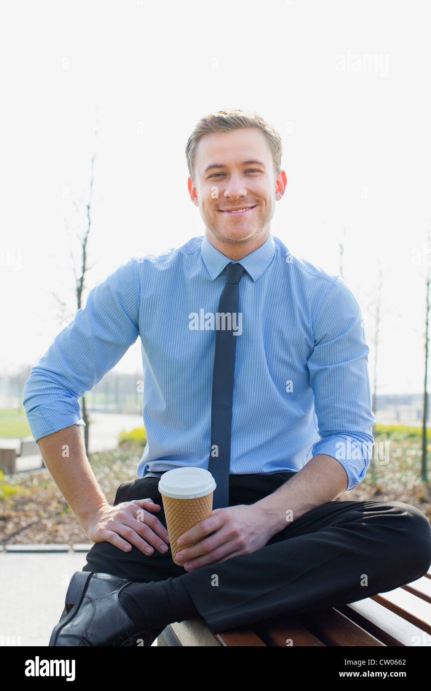 Businessman drinking coffee outdoors Stock Photo - Alamy Businessman drinking coffee outdoors Stock Photo - Alamy