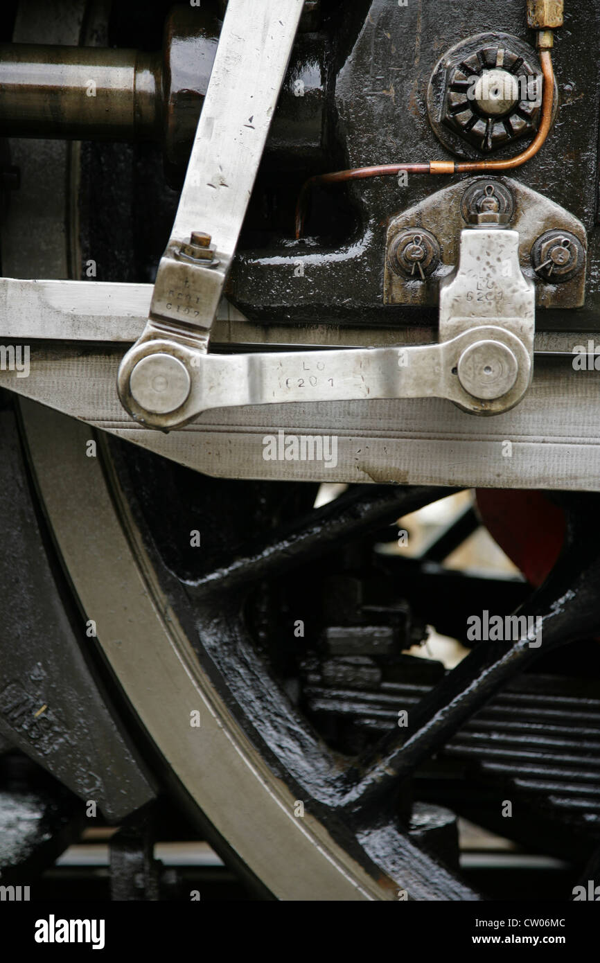 Driving wheel and valvegear of steam locomotive Stock Photo - Alamy