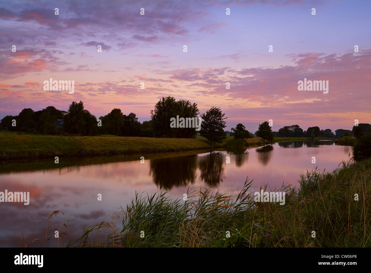 colorful summer sunrise on river in Groningen, Netherlands Stock Photo ...