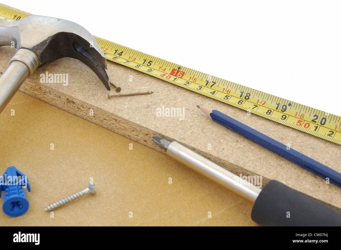 Wooden board, tools and sandpaper on a white background Stock Photo - Alamy