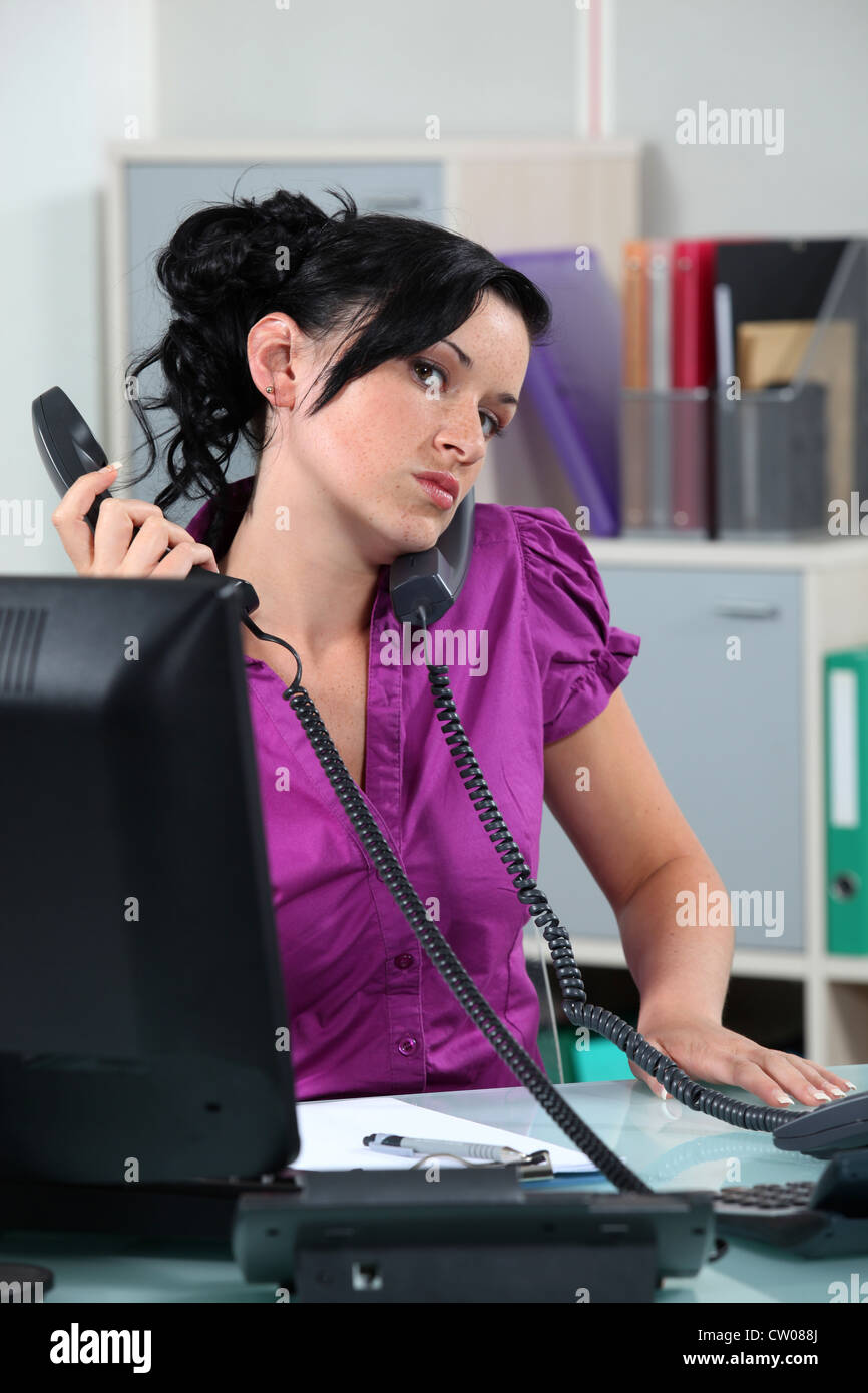 A busy secretary Stock Photo - Alamy