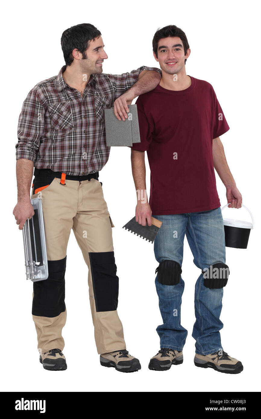 Two tilers ready to start work Stock Photo - Alamy