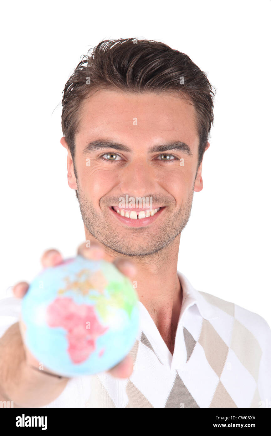 Man holding globe Stock Photo - Alamy