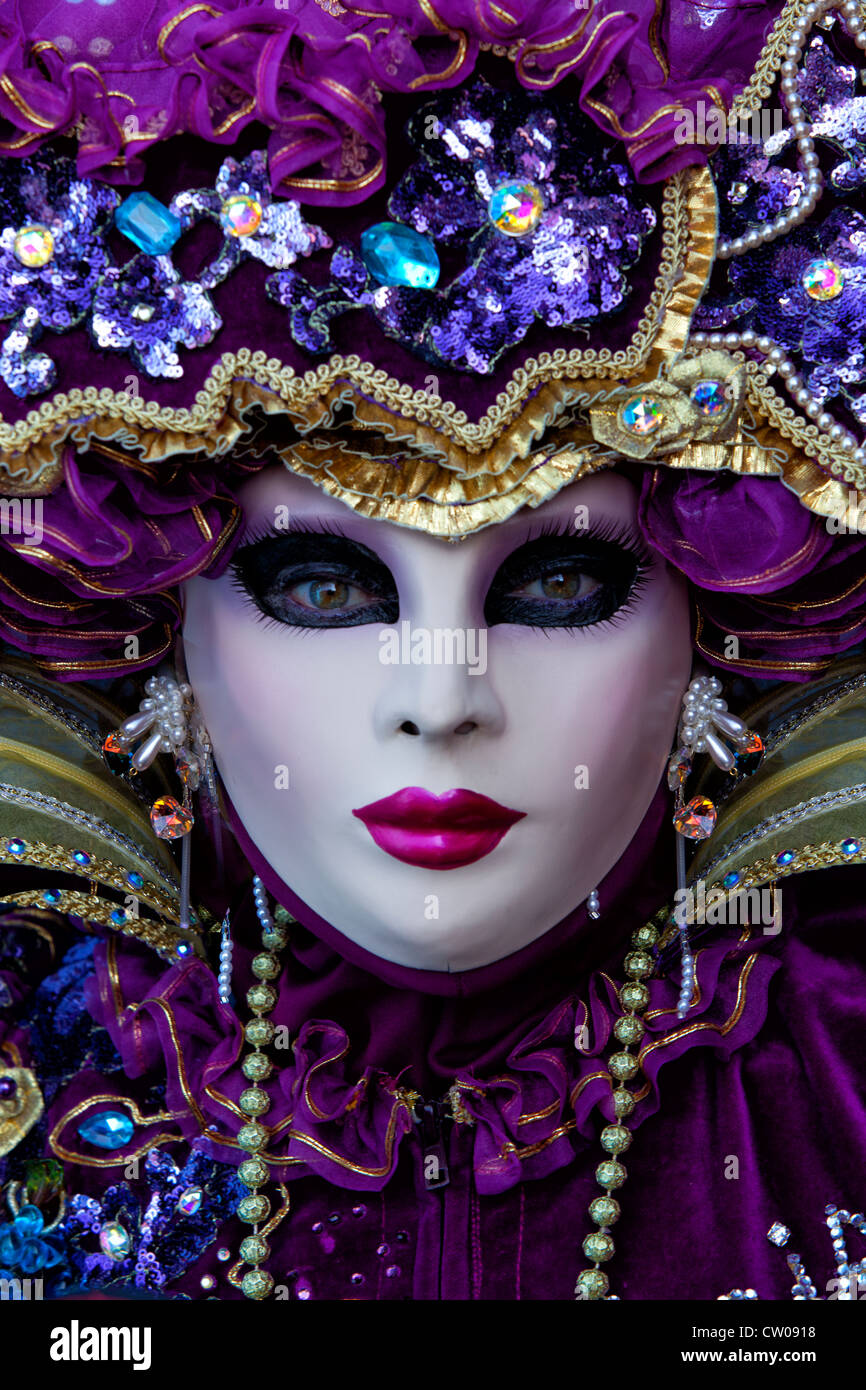 portrait of bright purple carnival mask Stock Photo - Alamy