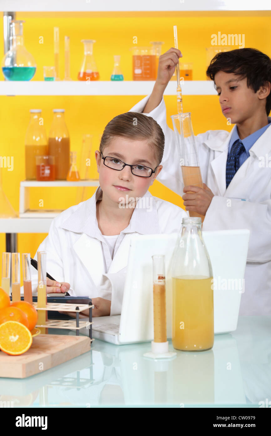 Kids in science lab Stock Photo - Alamy