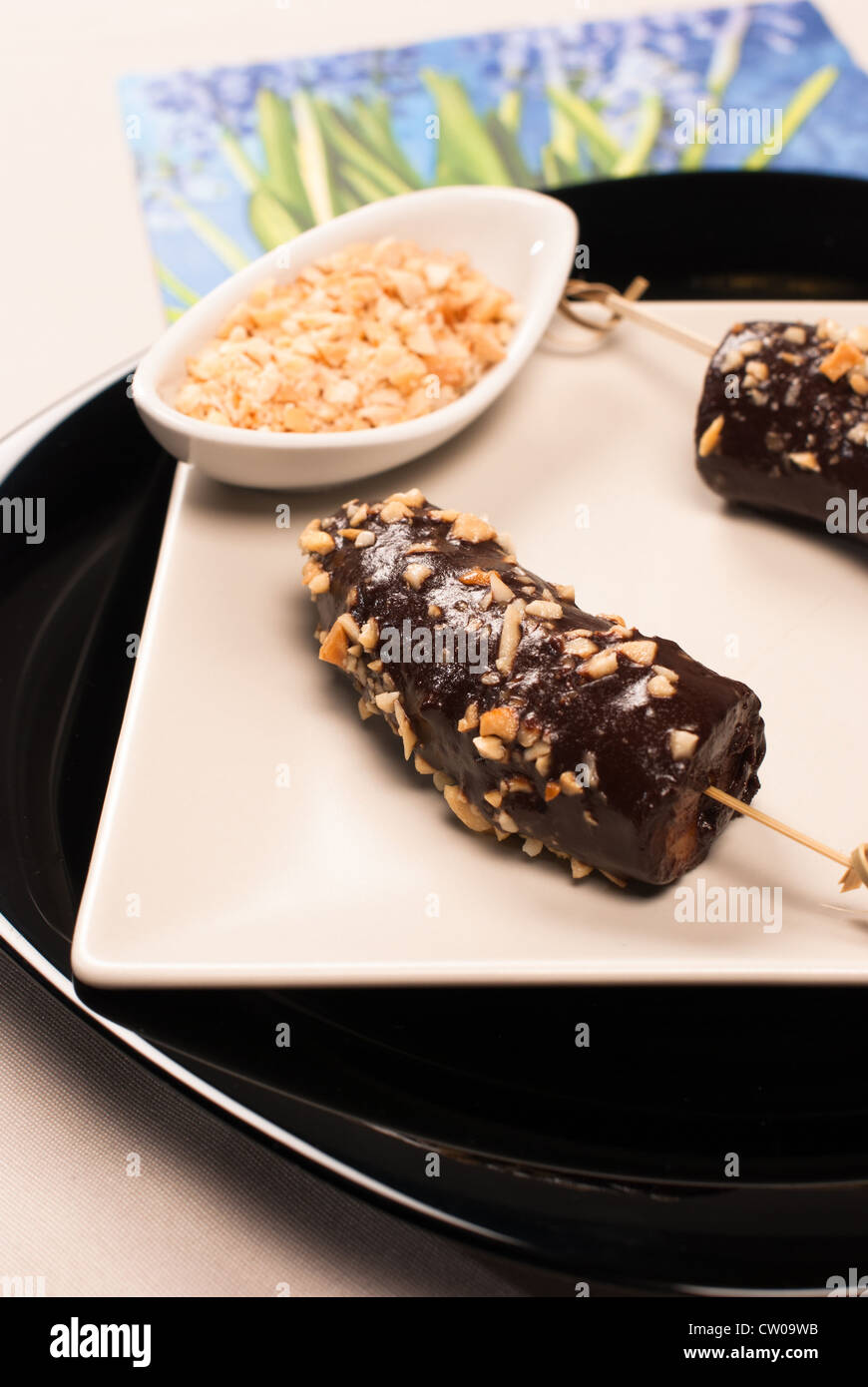 Chocolate coated bananas hi-res stock photography and images - Alamy