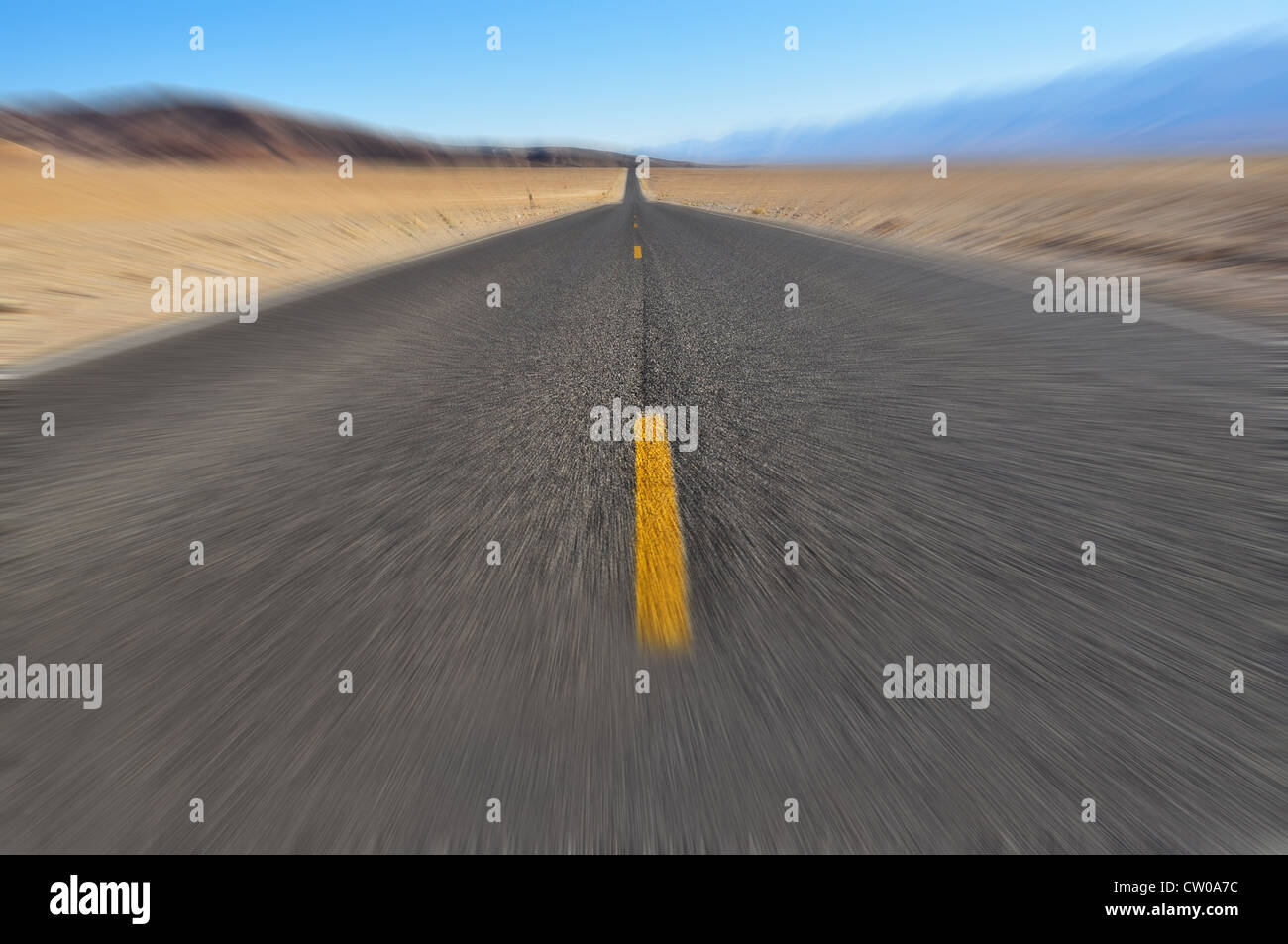 Road to the horizon with motion blur applied Stock Photo - Alamy