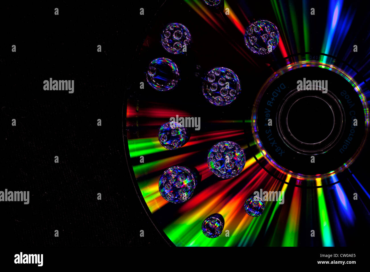 drops of water on CD with light beams Stock Photo - Alamy