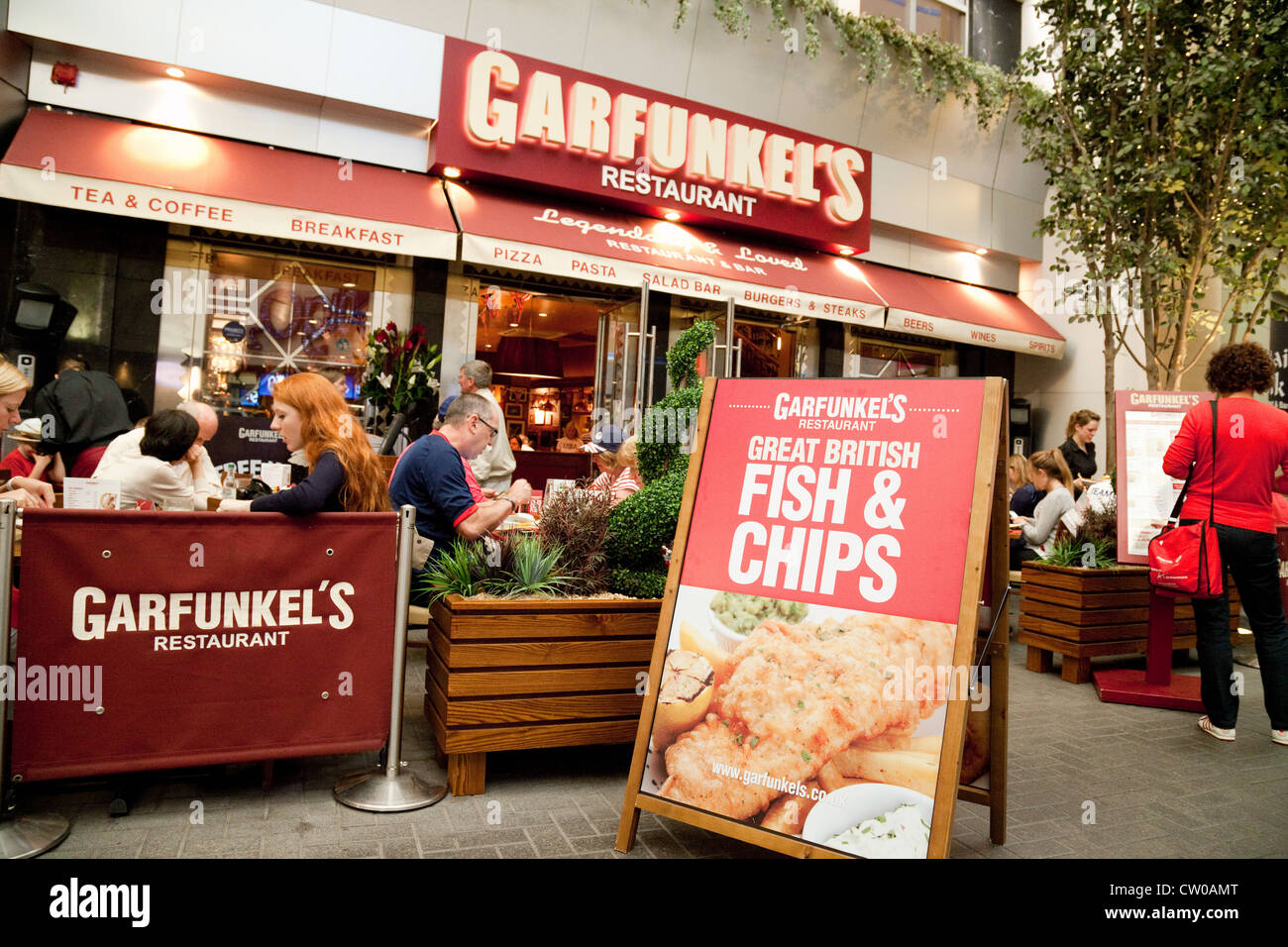 people eating a meal at Garfunkels restaurant, O2 arena, London UK ...