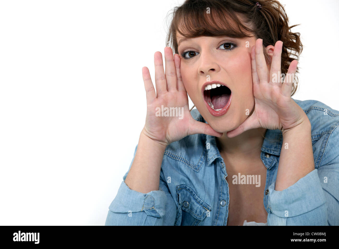 Attractive brunette girl shouting hi-res stock photography and images ...