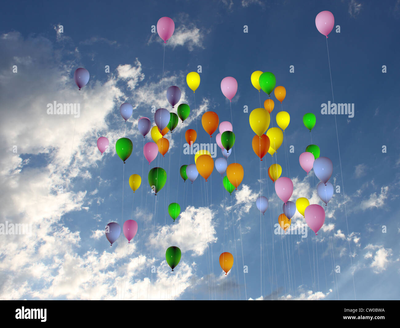 colored balloons flying up in the sky Stock Photo - Alamy