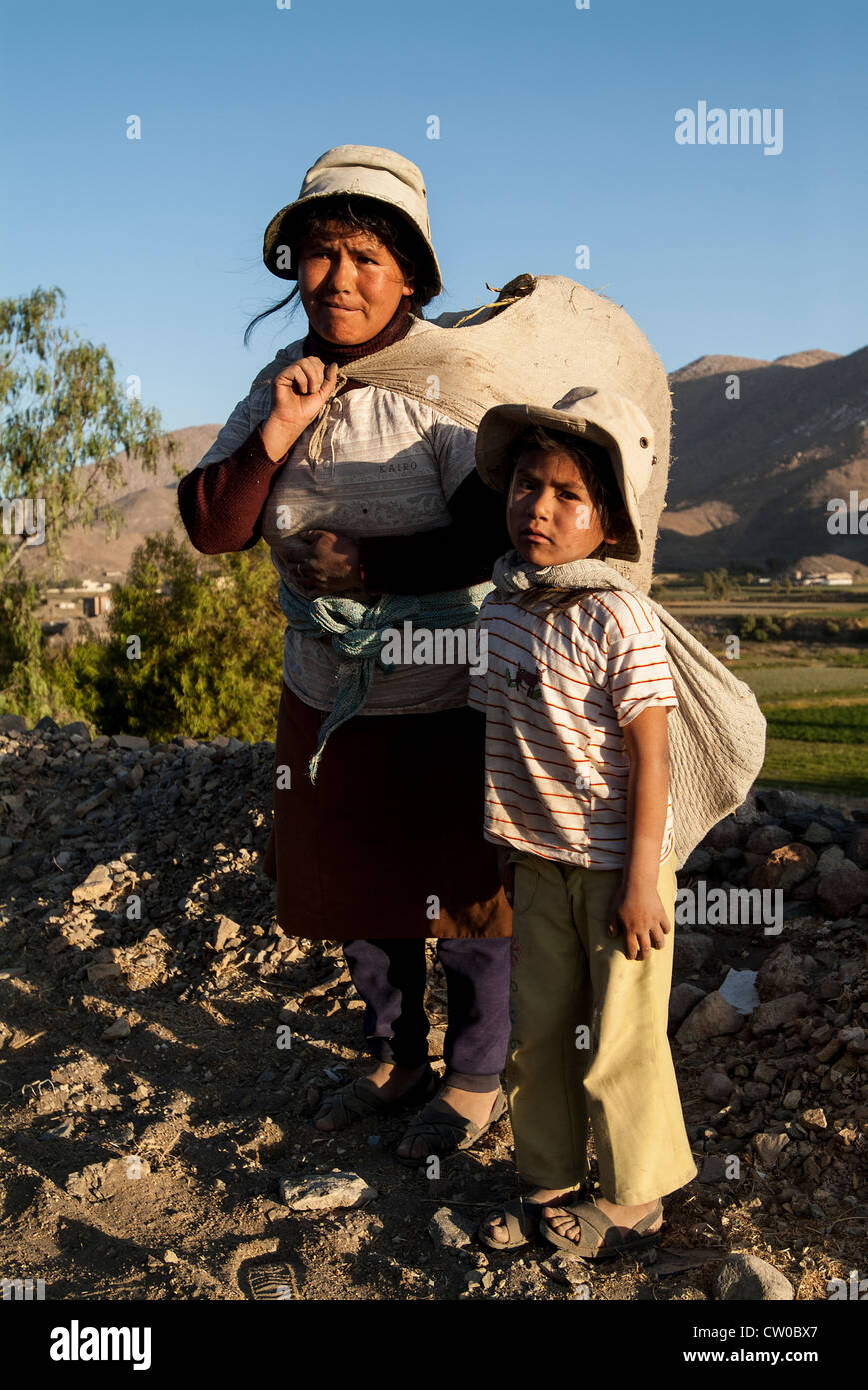 Children carrying heavy load hi-res stock photography and images - Alamy