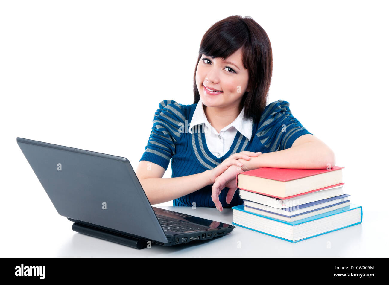Pretty Asian female student with laptop and books Stock Photo - Alamy