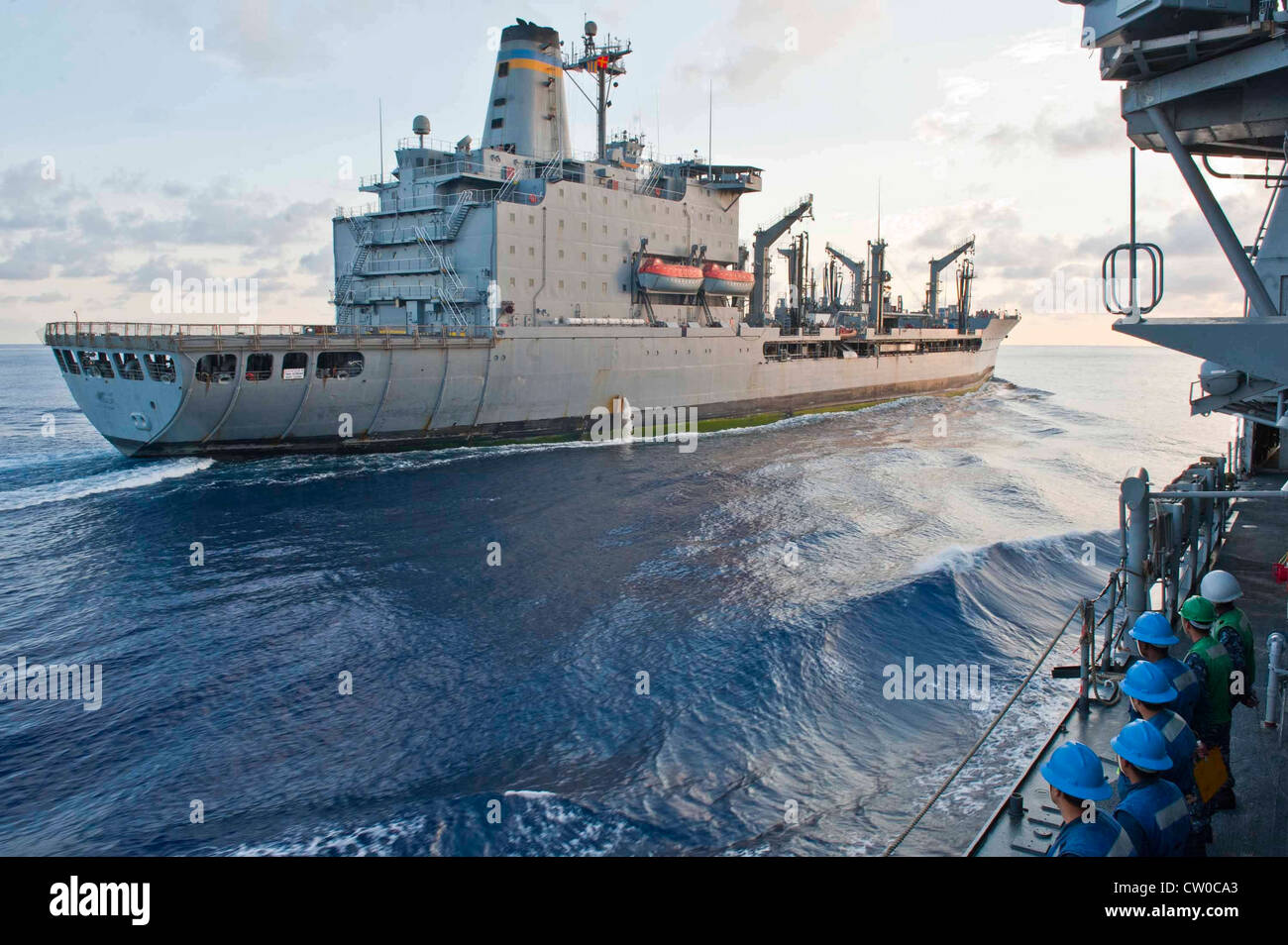 Sailors aboard the Ticonderoga-class guided-missile cruiser USS Cape St ...