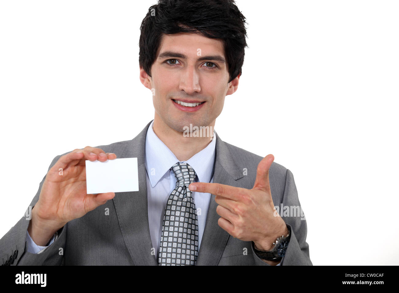 A businessman showing his card Stock Photo - Alamy