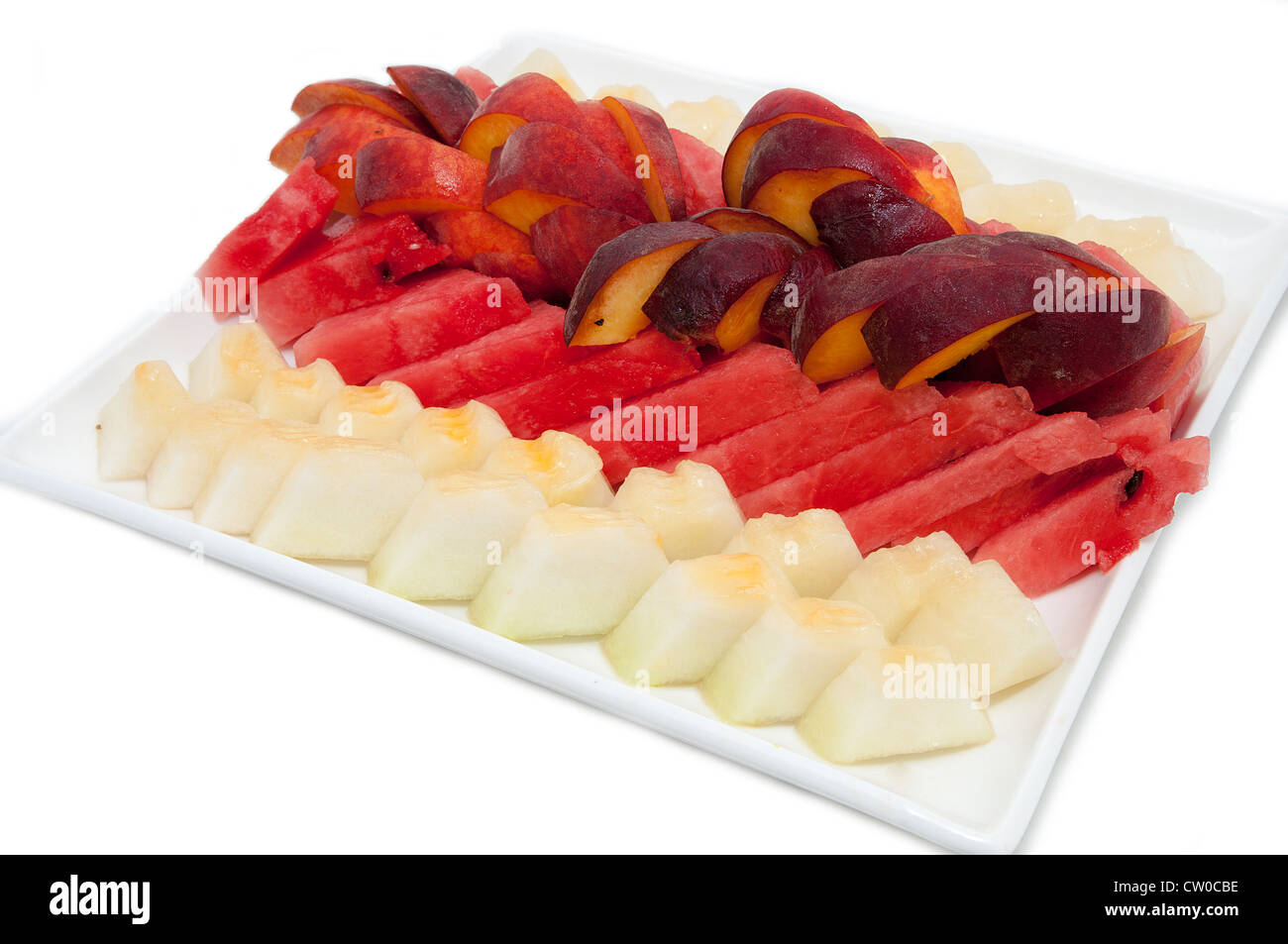 a plate of sliced fruit Stock Photo - Alamy