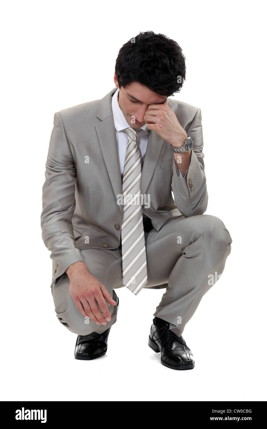 A sad businessman Stock Photo - Alamy
