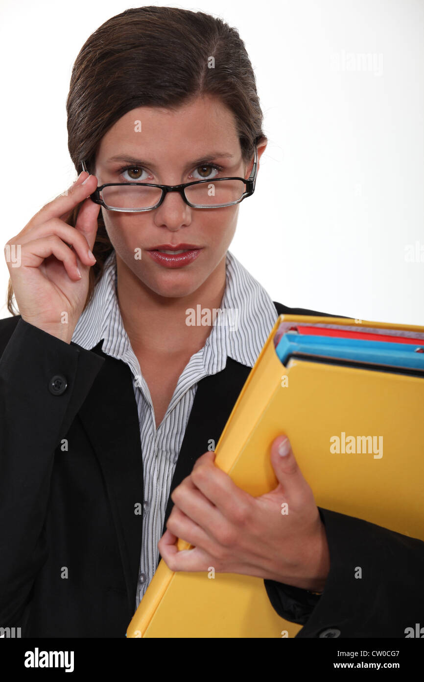 brilliant female executive holding files Stock Photo - Alamy